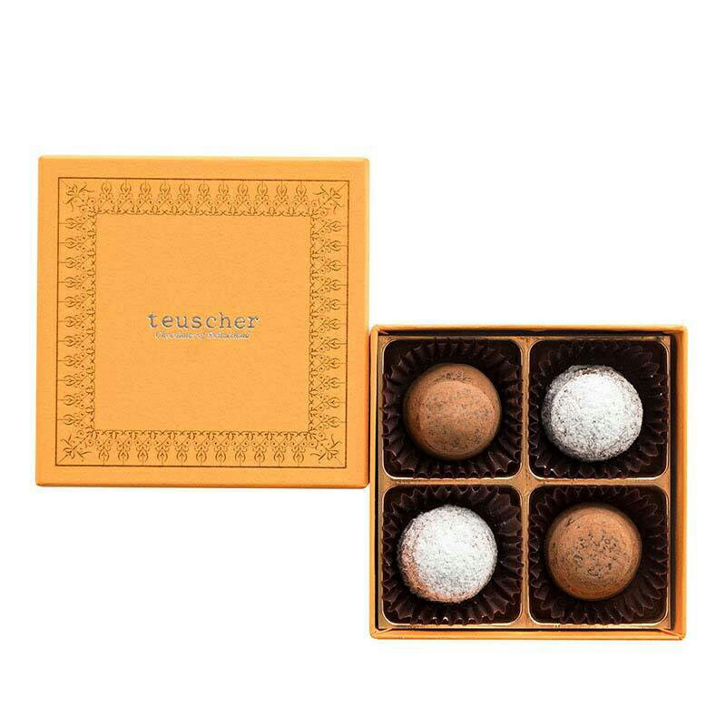 至福のチョコレートをスイスの名門、トイスチャーから。 1947年の登場以来、世界中の食通に愛される『シャンパントリュフ』の、まるで宝石のような贅沢な味わいをお楽しみください。［内容］シャンパン・ダーク×各2［箱サイズ］9.5×9.5×4.5...