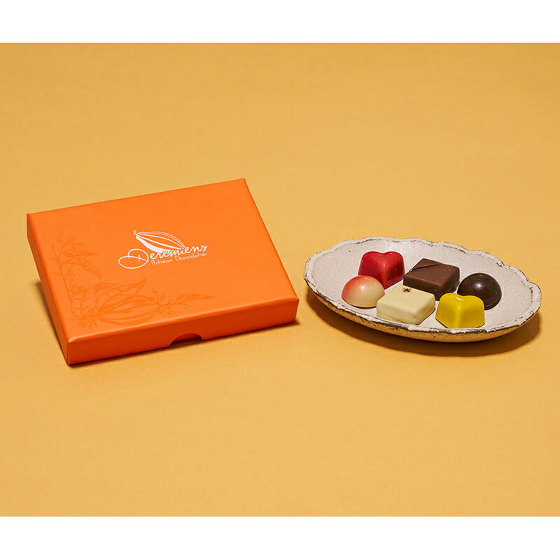 人気商品を集めたキュート＆ラグジュアリーなアソート。 ベルギー発ブランドの実力派ショコラティエが日本のために特別にセレクトしたチョコレートです。世界中から選び抜いた、希少なカカオ豆本来の香りが楽しめる珠玉の6粒をお楽しみください。［内容］チ...