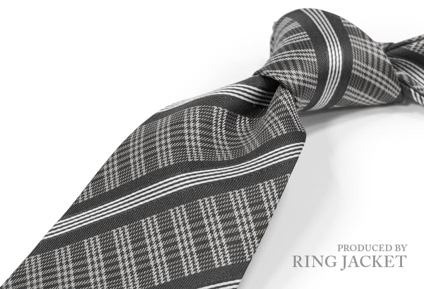 ギフト対応 左の画像をクリックすると拡大表示されます。 色　柄 グレー系チェック地にチャコールグレー×オフホワイトのストライプ柄 素　材 SILK 100% サイズ 大剣幅 ： 約8.5cm　/　全長 ： 約145cm / (共に多少個体差...