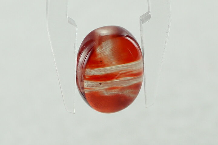 サイズ:約 0.9×0.7×0.4cm　2.21ct アンデシンのルースが入荷いたしました。 特徴的な赤色の透明感がとても美しいルースです。 宝石質グレードのルースでございます。　