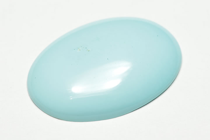 約2.2×1.6×0.35cm 9.6ct　 アリゾナ州キングマン鉱山産出の高品位ターコイスです。 含浸処理なしでトリートマントのみのカボションルースです。 キングマン鉱山はアメリカンターコイスの代表産地で、鮮やかなスカイブルーの発色で人気...