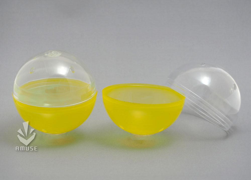 直径75mmの半身透明、半身黄色のカプセルです。 空カプセル約500個入りです。 【商品詳細】 約500個入りは【業務用梱包品】です。工場から仕入れたそのままの箱でお届けいたします。 重量で箱詰めしているため、個数が多少増減する場合がありま...