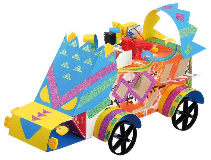 リサイクルカー工作キット ￥550（税込） ￥500（税抜） 牛乳パックでモーターカーがつくれる！ # 仕様 作例：約280×145×150mm # 商品サイズ 作例：約280×145×150mm セット内容 電池ボックス×1、ブロックコネ...