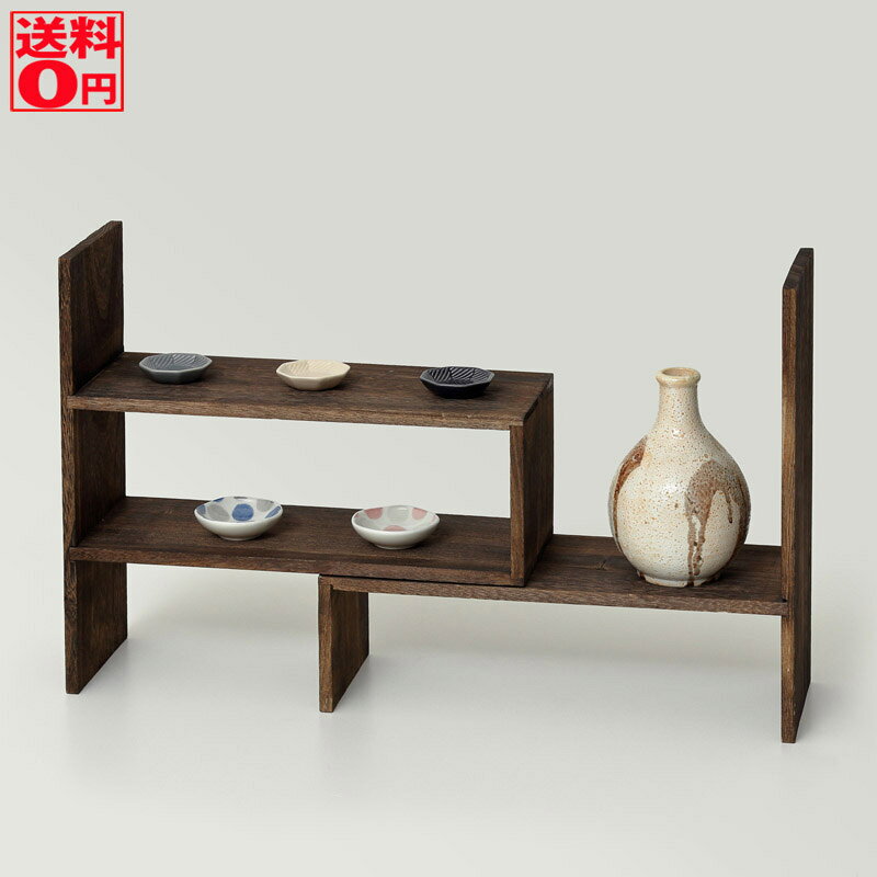 商品名：焼桐 スライドディスプレイラック 商品No.：64855 サイズ：幅42.5×奥行15×高さ40cm 材質：天然木 ＜桐＞、ラッカー塗装 ポイント： 1吸湿性・調湿性があるとされる桐材を使用しています。 2趣を出すため、表面を火で焦...