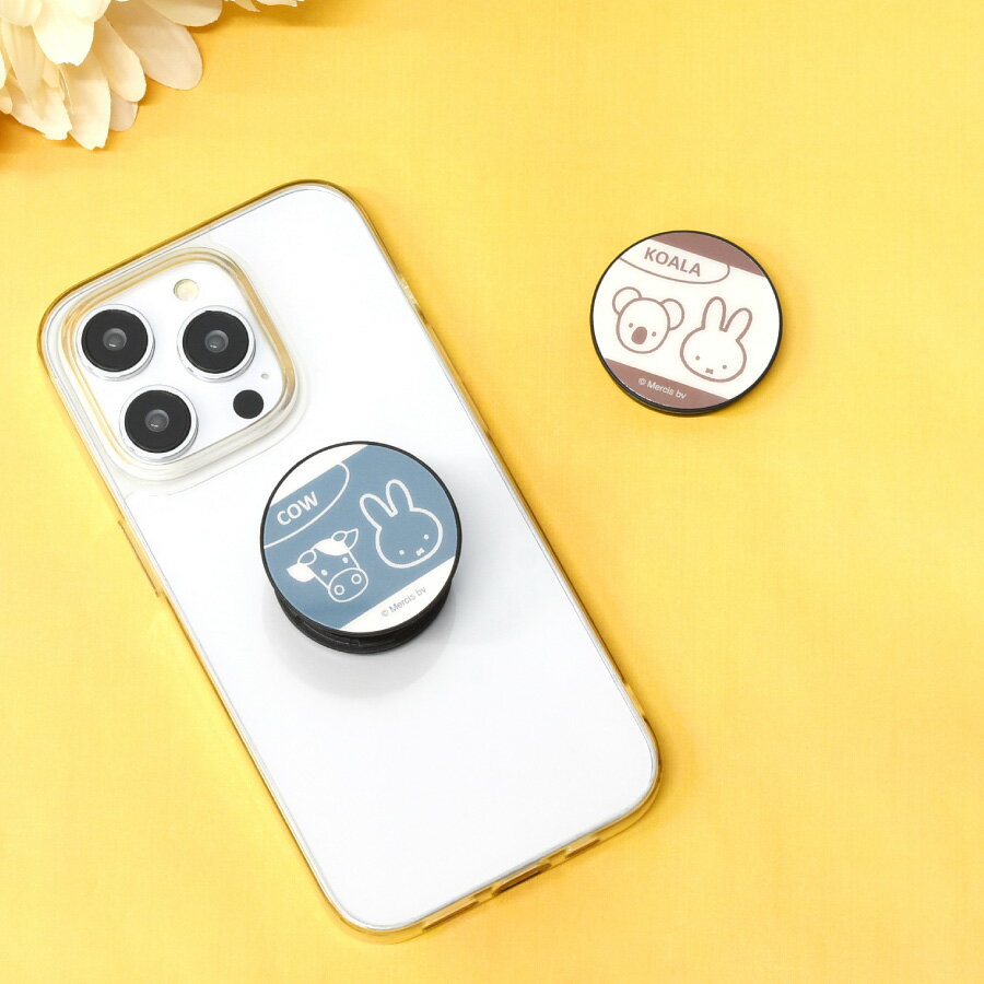 スマートフォンの背面に貼り付けるアクセサリです。スマートフォンの持ちやすさを向上します。スタンドとしてもご使用いただけます。使用時：本体上部をスピンすると自動的に飛び出します収納時：上部をスピンしながら押し込み収納します接着面が十分に広く平...