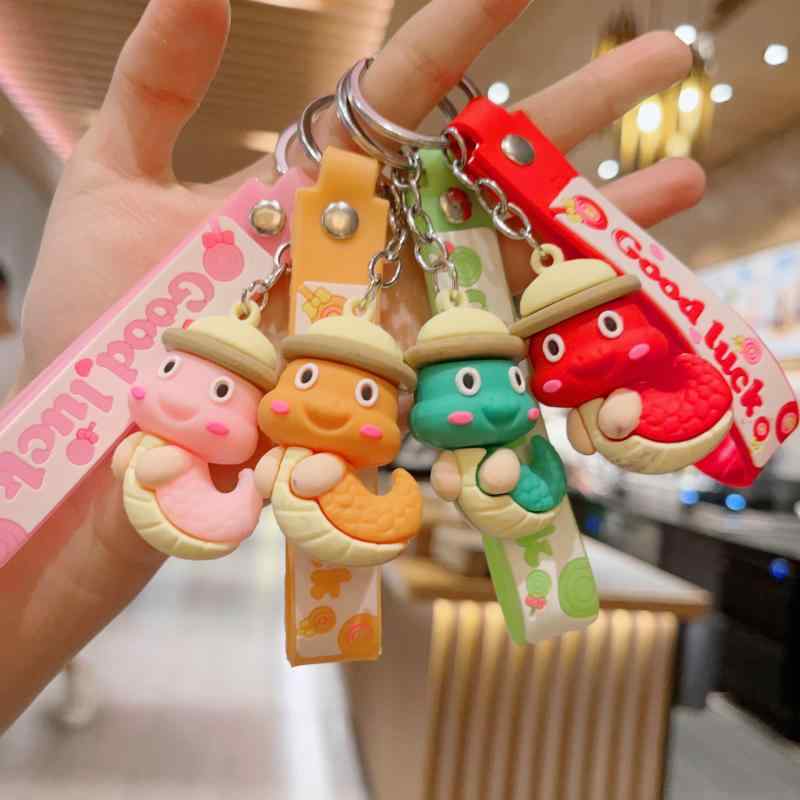 ・カテゴリ: キーホルダー・スタイル: カートゥーン・主な素材: シリコン・カラー展開: レッド、ピンク、グリーン、オレンジ