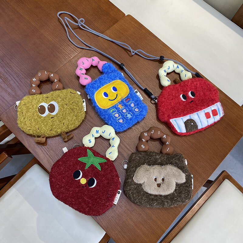 このかわいいミニバッグは、韓国ファッションのトレンドを取り入れたデザインです。ショルダーバッグとしても使えるので、普段使いにもぴったり。個性的なデザインで、あなたのスタイルを引き立てます。おしゃれなアイテムを手に入れて、周りと差をつけましょう！