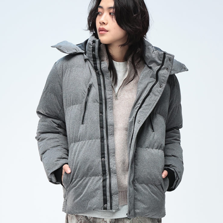 杢の表情とストレッチ性。都市型高機能中綿アウター。S&SONS（エスアンドサンズ）から、洗練された杢（もく）の表情が魅力の中綿ジャケットが登場。表地はストレッチ性に優れたポリエステル素材で、動きやすくストレスフリーな着心地を男性に提供します...