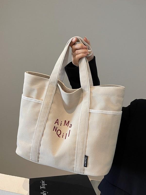 ・カラー展開: ブラック、オフホワイト、レッド、カーキ・スタイル: 海外トレンド・素材: キャンバス・デザイン: ロゴ、プリント・裏地素材: ポリエステル・開閉方法: ファスナー・内側構造: ファスナーポケット・硬さ: やや柔らかめ・外ポケ...