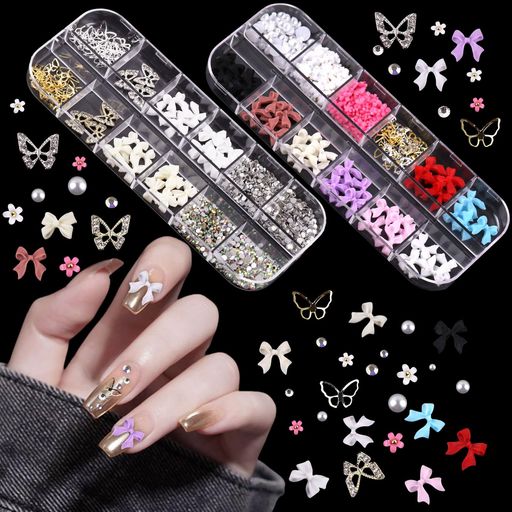 材質:樹脂 サイズ:画像をご参照ください。 可愛いリボン、くまや蝶々が入っていたネイルパーツセットです。黒、赤、ベージュ、オーロラ、ホワイトなど多種類の色があります。ランダム色! 半円パールも付いています。立体感がある大きめなネイルパーツは...