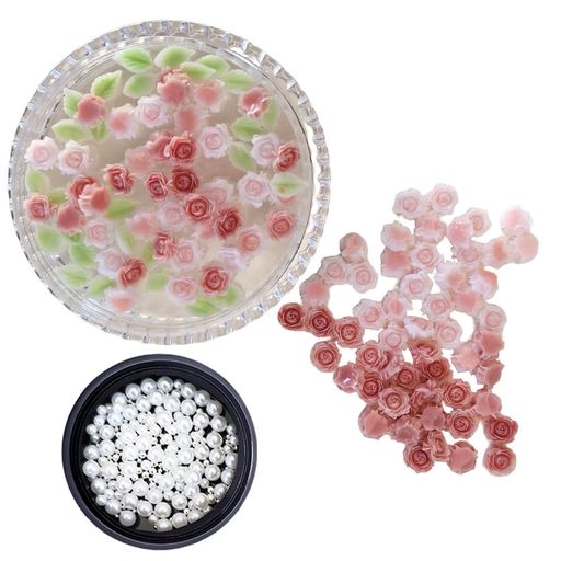 【商品名】花ネイルパーツセット 【セット内容】1箱薔薇ネイルバ一ツ(花約100個サイズ6*6mm;葉約20個サイズ8*6mm)+1箱パ一ルとプリオン(サイズ1-3mm) 【素材】花素材は樹脂で、軽量で取り扱いやすく、立体感があり存在感が際立...
