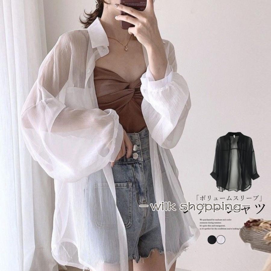 素材：ポリエステル100%カラー：ブラック/ホワイトサイズ：ワンサイズ(XXL)着丈:前丈約67cm/後丈約73cm 肩幅:約62cm 袖丈:約41cm ゆき:約72cm 身幅:約65cm 胸囲:約130cm裏地：なし伸縮性：なし透け感：あ...