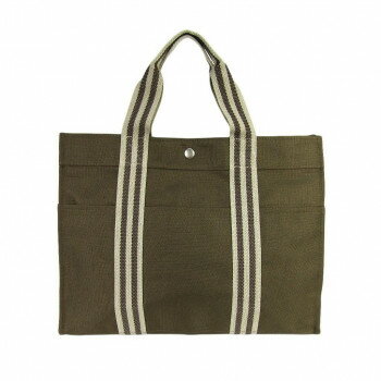 ※パッケージ、デザイン等は予告なく変更される場合があります。※画像はイメージです。商品タイトルと一致しない場合があります。シンプルなデザインにラインベルトのアクセントがきいた、A4の手提げトートバッグです。持ち手は短めの手提げタイプです。A...