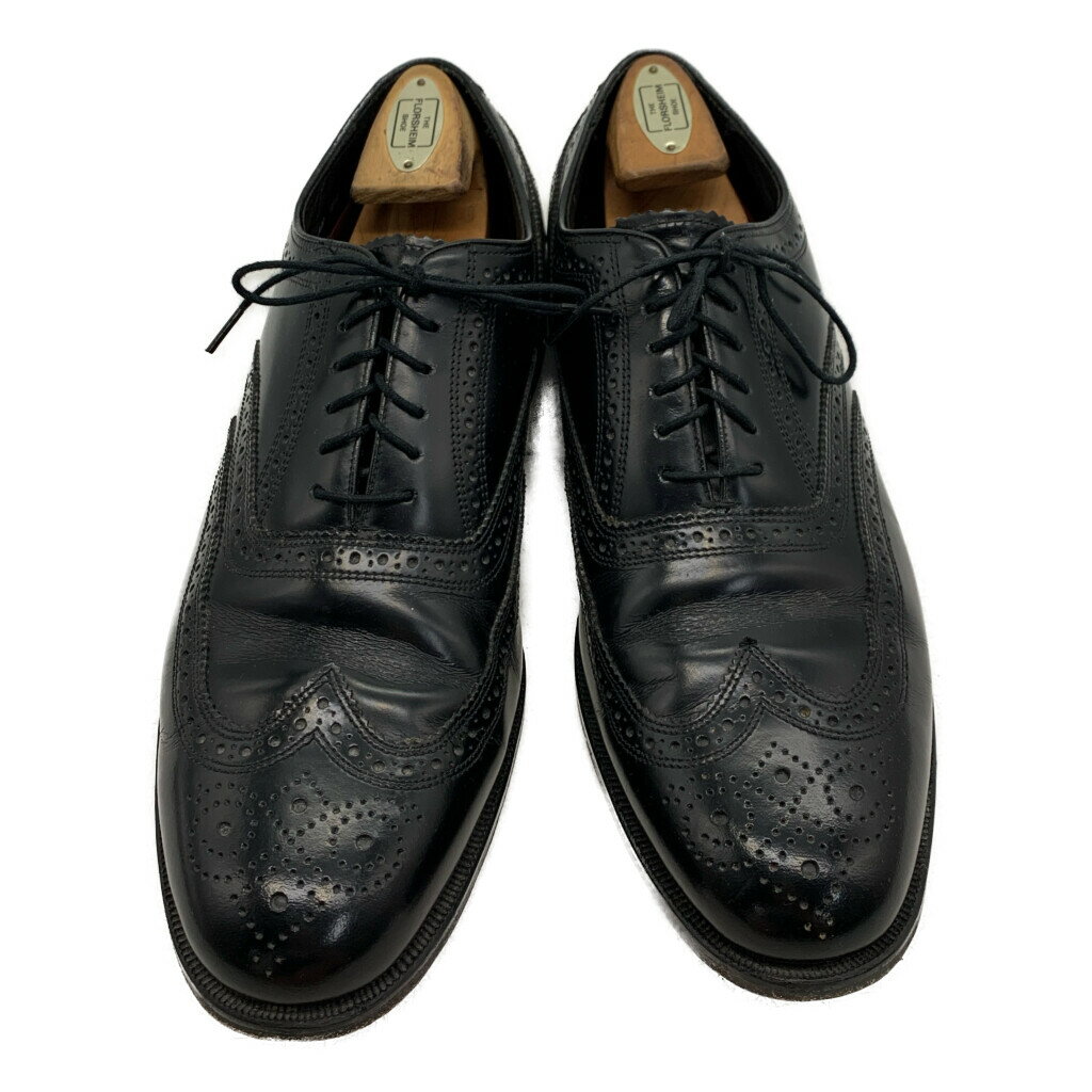 DESCRIPTION ブランドFLORSHEIM/フローシャイム サイズ【サイズ】9 1/2 D 【実寸】 (アウトソール)全長：約30cm最大幅：約10.5cm最小幅：約7cmヒール高さ：約2cm 主な素材 色ブラック 仕様 ウィングチ...