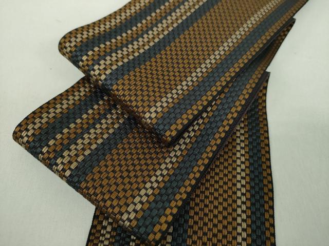 ■■■　サイズ　■■■ 長さ 422cm 幅 9cm程 ■■■　商品詳細　■■■ 【正絹】 状態は接写画像のように裏地所々に薄い汚れ、表地所々に若干の薄い汚れがございます。 本場筑前博多織は、 福岡県福岡市博多区やその周辺で生産される絹織物...