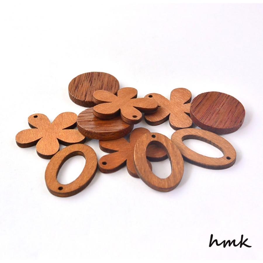 ウッドパーツ ×10PCS 種類は、丸型・くりぬき丸型・花型の3種類。アクセサリーパーツやピアス、その他モチーフとして ご利用くださいませ。通し穴がございますので、ビーズやパーツをつなぎ合わせてアレンジ自由です◎ご注文の際にご希望の種類をオ...