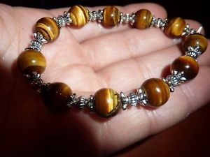 bracelet oeil de tigre 10 mm et argent du tibetブレスレットデティグレアルジェントチベット※注意※NYからの配送になりますので2週間前後お時間をいただきます。人気の商品は在庫が無い場合がございま...