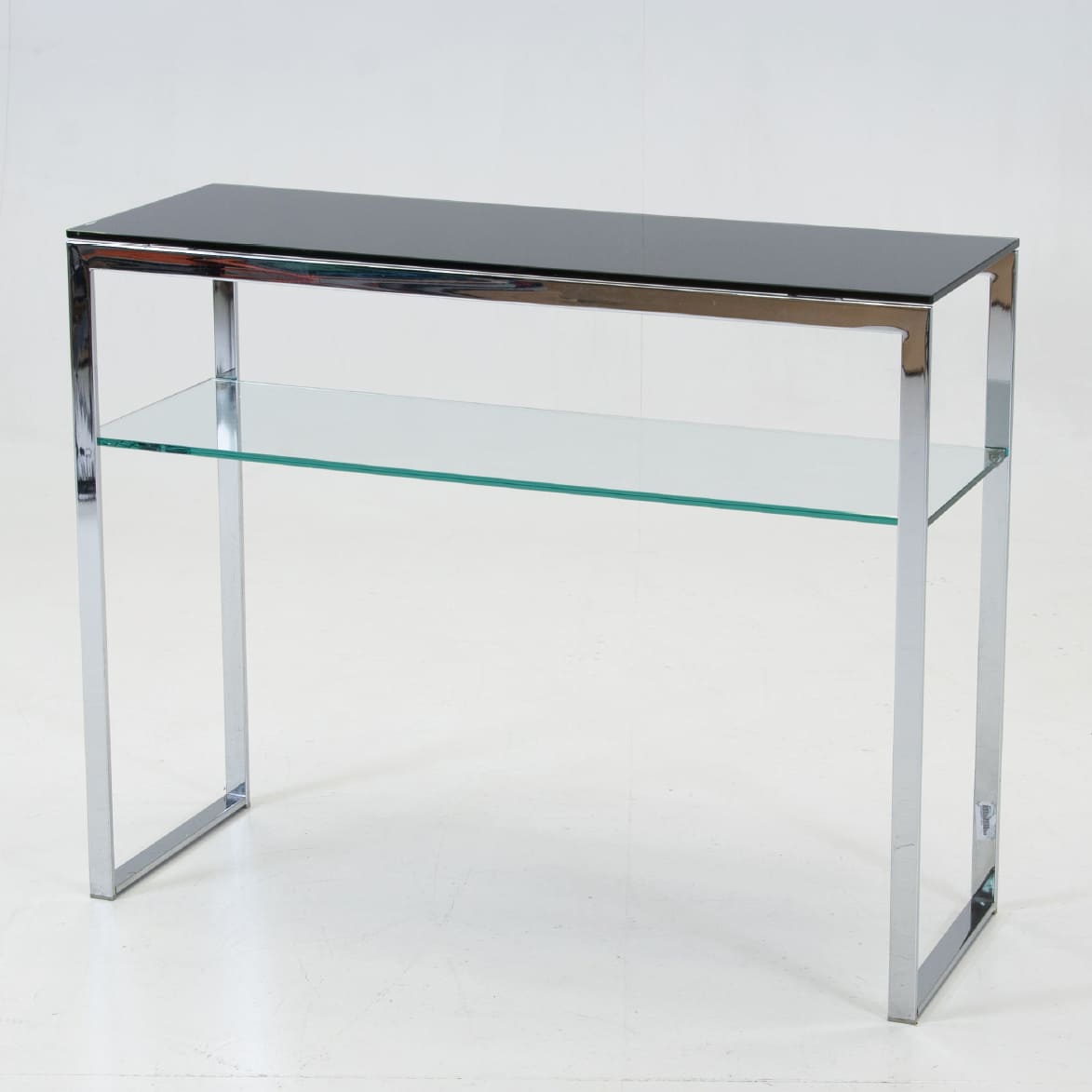 商品詳細（サイズ）■天板：強化ガラス（ブラッククリア）■棚板：強化ガラス■フレーム：スチール（クロムメッキ）■生産地：イタリア製■サイズ：W1000×D350×H800■補足：お客様組立品【注意事項】※5kg以上のものは乗せないでご使用くだ...