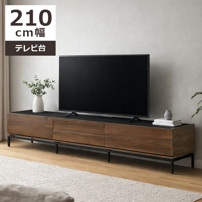 商品について ■商品の特徴 モダンテイストの美しいディティールがおしゃれなテレビボード。 前面と側面にすべてウォールナットの突板を使用。 フラップ扉はガラスに突板を張り合わせておりリモコンも可能です。 本体と脚の間には空間をあけ浮いた様なデ...