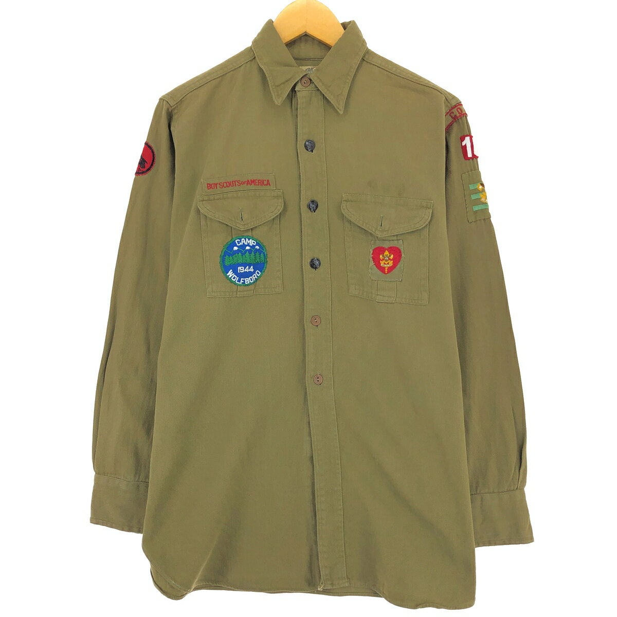 商品詳細 ブランド・BOY SCOUTS OF AMERICA・ 特徴・レギュラーカラー・長袖・ モデル/形状・長袖 ボーイスカウトシャツ・ 素材・不明・ 色・カーキ系・ 柄・無地・ロゴ刺繍・ 生産国・不明・ 年代 サイズ・メンズM・表記サ...