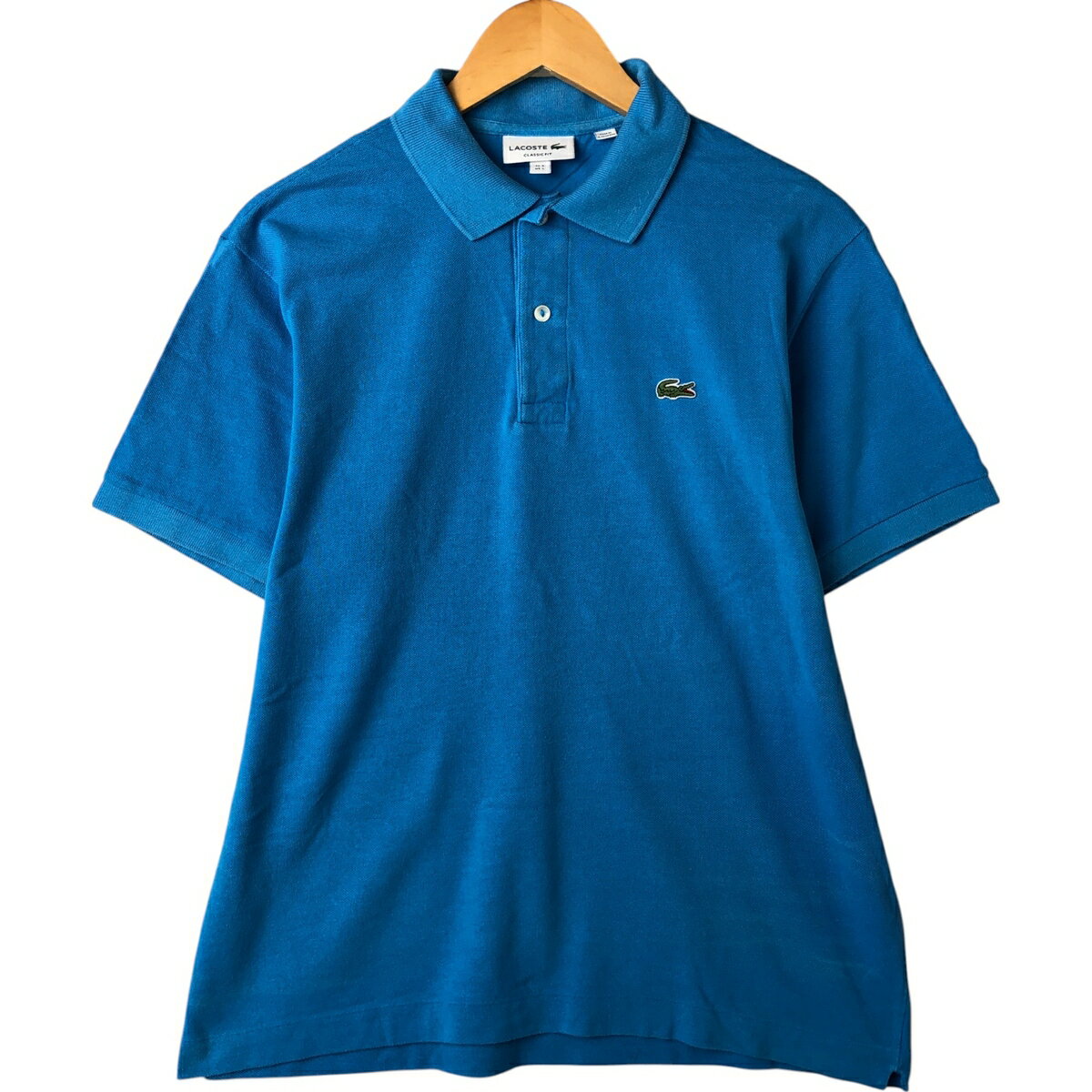 商品詳細 ブランド・LACOSTE・ラコステ・ 特徴・レギュラーカラー・半袖・ モデル/形状・半袖 ポロシャツ・ 素材・コットン:100%・ 色・ブルー系 水色・ 柄・無地・ワンポイント・ 生産国・エルサルバドル製・ 年代 サイズ・メンズL...