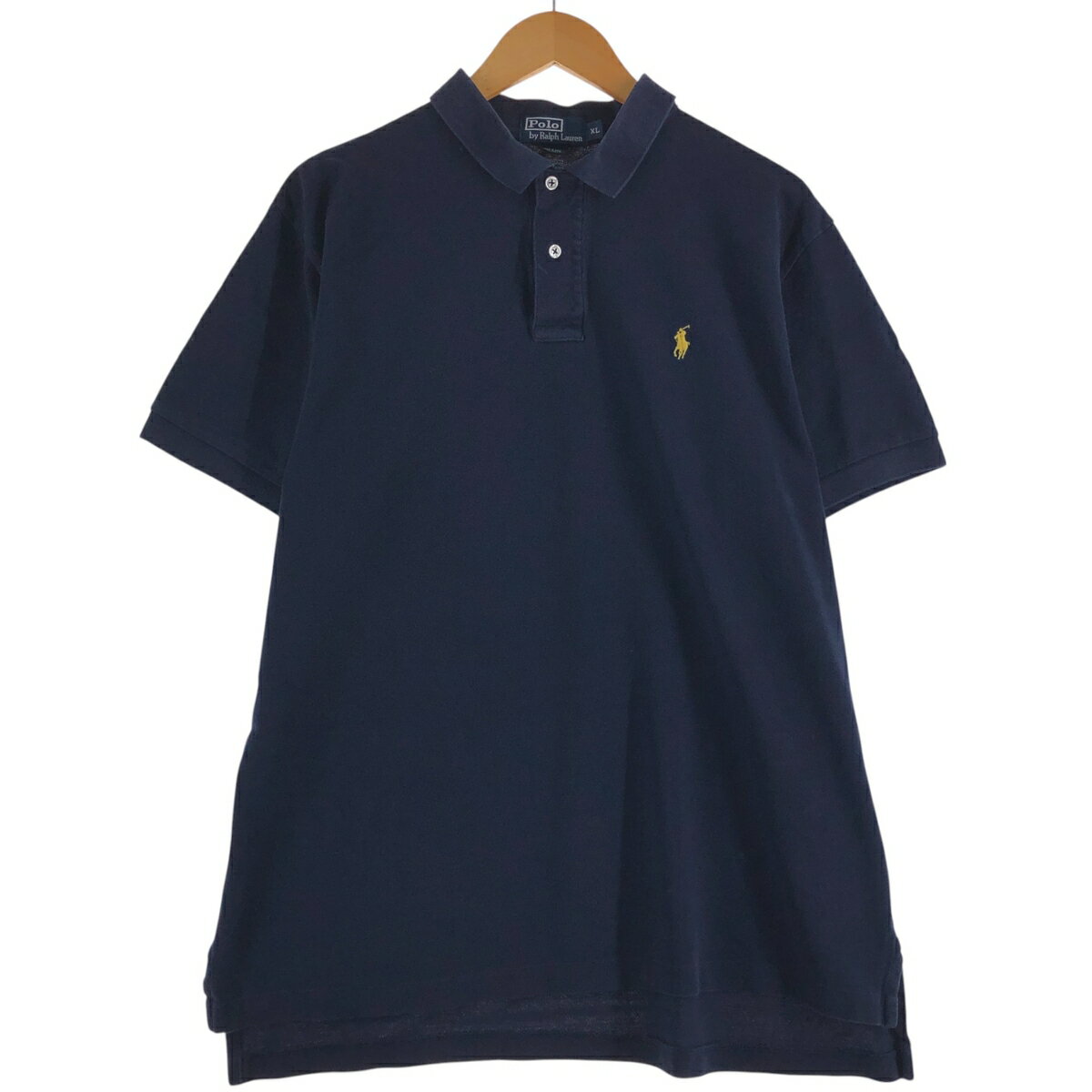 商品詳細 ブランド・Ralph Lauren・ラルフローレン・ 特徴・半袖・レギュラーカラー・ モデル/形状・POLO by Ralph Lauren・半袖 ポロシャツ・ 素材・コットン:100%・ 色・ネイビー系 紺色・ 柄・無地・ワンポ...