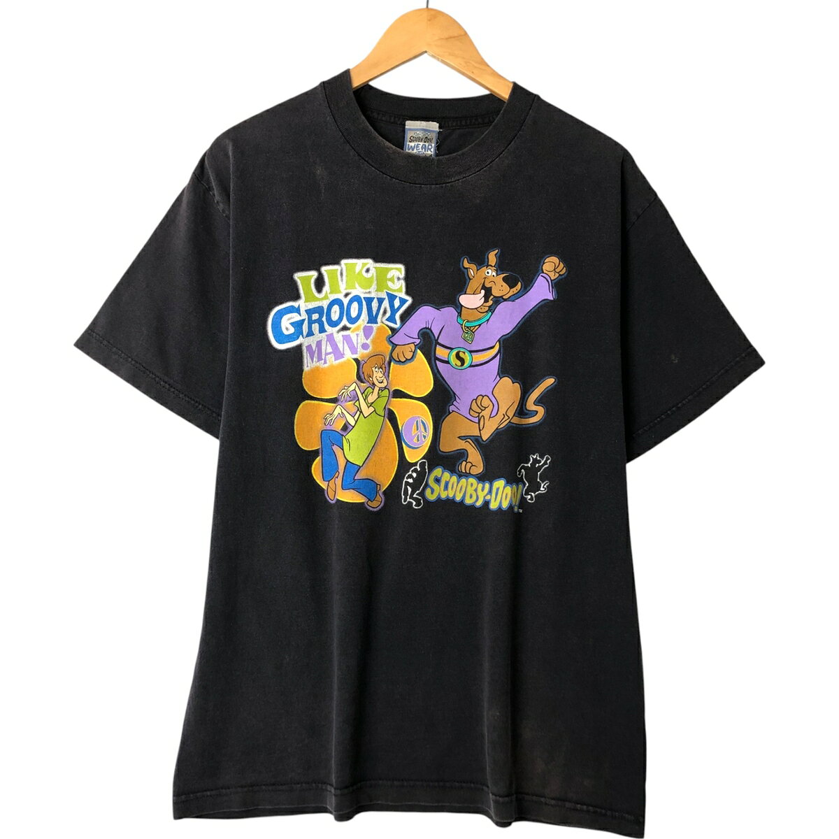 商品詳細 ブランド・Scooby-Doo WEAR・ 特徴・クルーネック(丸首)・半袖・ モデル/形状・Scooby-Doo スクービードゥー・キャラクタープリントTシャツ・ 素材・コットン:100%・ 色・ブラック系 黒色・ 柄・プリント...