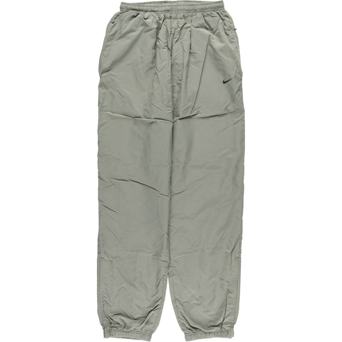 商品詳細 ブランド・NIKE・ナイキ・ 特徴・ウエスト調節ひも・裾ジップ・ モデル/形状・ナイロンパンツ シャカシャカパンツ・ 素材・ナイロン:100%・ 色・カーキ系・ 柄・ロゴ刺繍・ワンポイント・ 生産国・中国製・ 年代・00年代・ サ...