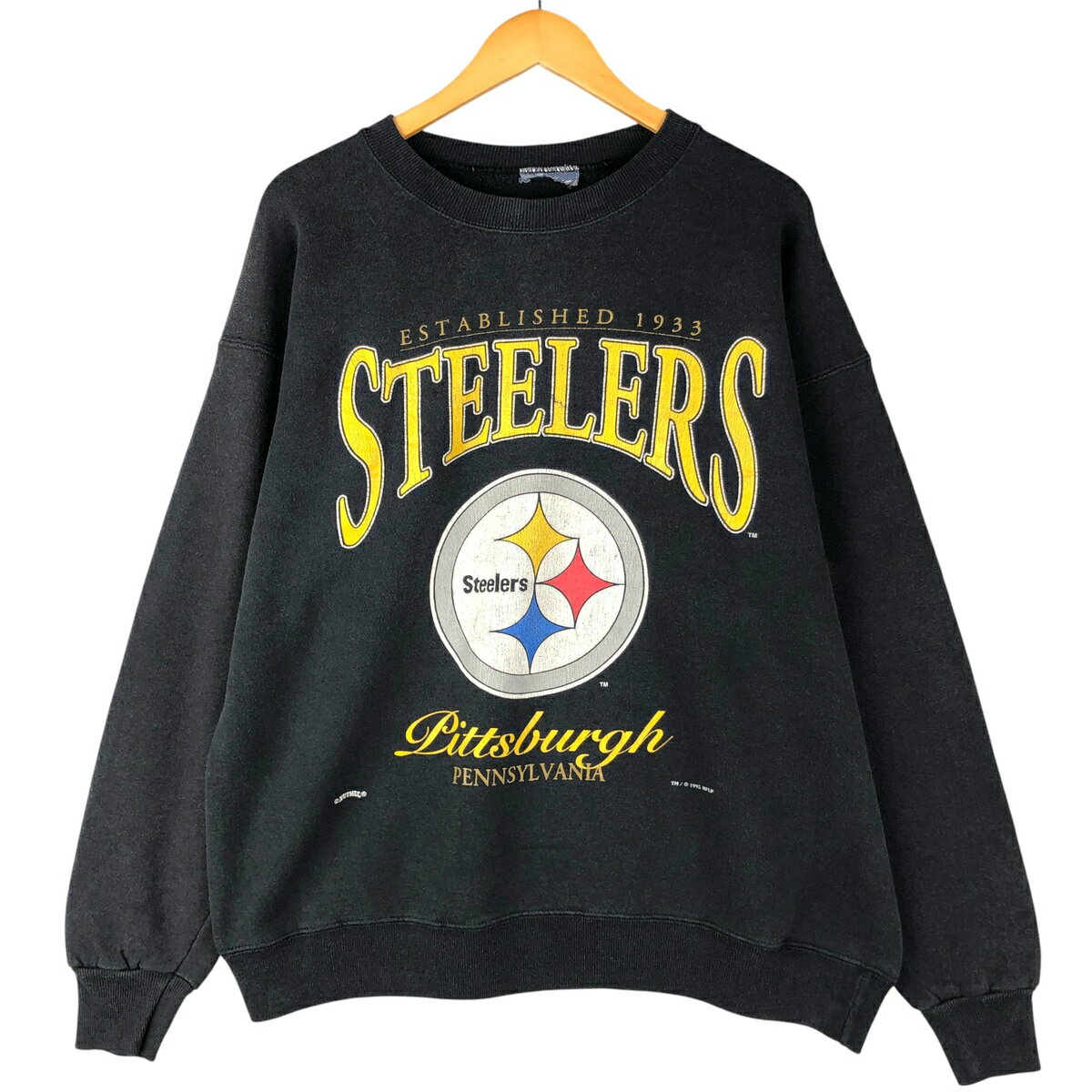 商品詳細 ブランド・NUTMEG・ナツメグ・ 特徴・クルーネック(丸首)・長袖・ヴィンテージ・フェード・ モデル/形状・NFL PITTSBURGH STEELERS ピッツバーグスティーラーズ・プリントスウェットシャツ トレーナー・ 素材...