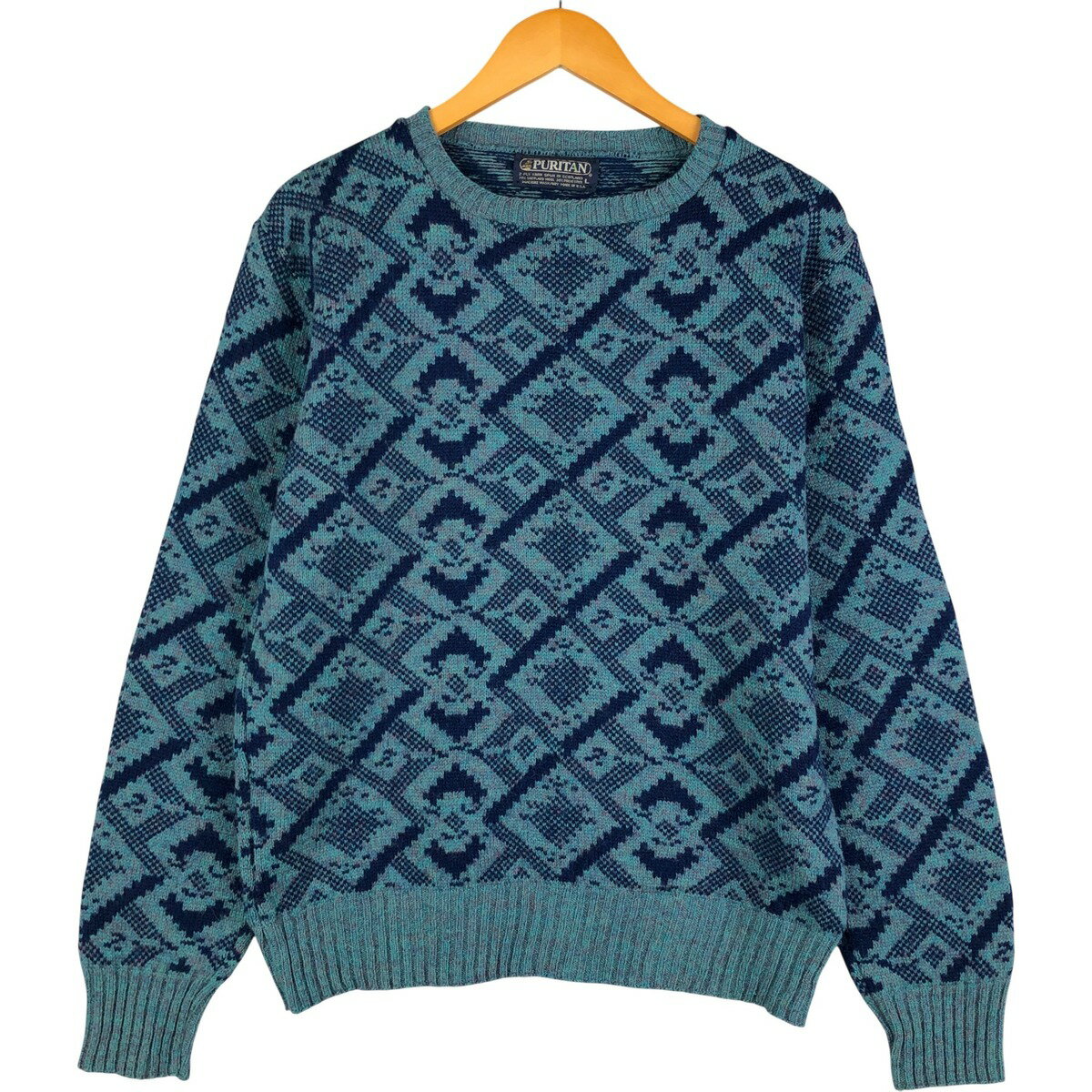 商品詳細 ブランド・PURITAN・ 特徴・クルーネック(丸首)・長袖・ モデル/形状・ウールニットセーター・ 素材・ウール:70%・ポリエステル:30%・ 色・ターコイズブルー・ 柄・総柄・ 生産国・USA製・ 年代 サイズ・メンズL・表...