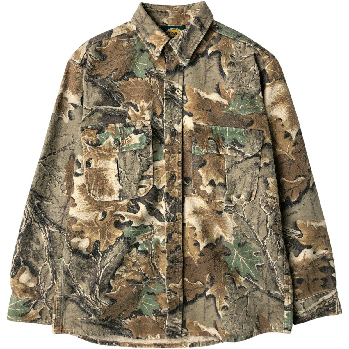 商品詳細 ブランド・Cabelas・カベラス・ 特徴・厚手・レギュラーカラー・長袖・ヴィンテージ・ モデル/形状・長袖 ヘビーネルシャツ・ 素材・コットン:100%・ 色・カーキ系 ブラウン・ 柄・迷彩柄・リアルツリーカモ・ 生産国・USA...