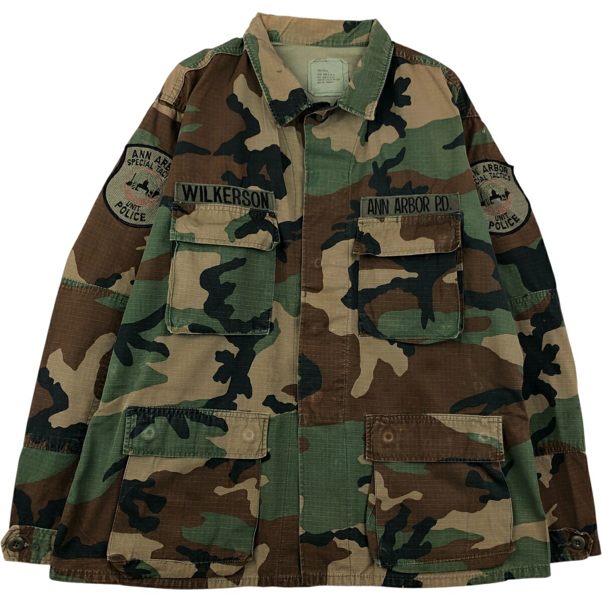 商品詳細 ブランド・UNKNOWN・ 特徴・薄手・米軍実品・85年納品・リップストップ・長袖・ モデル/形状・COAT HOT WEATHER WOODLAND CAMOUFLAGE PATTERN COMBAT・B.D.U ミリタリージャ...