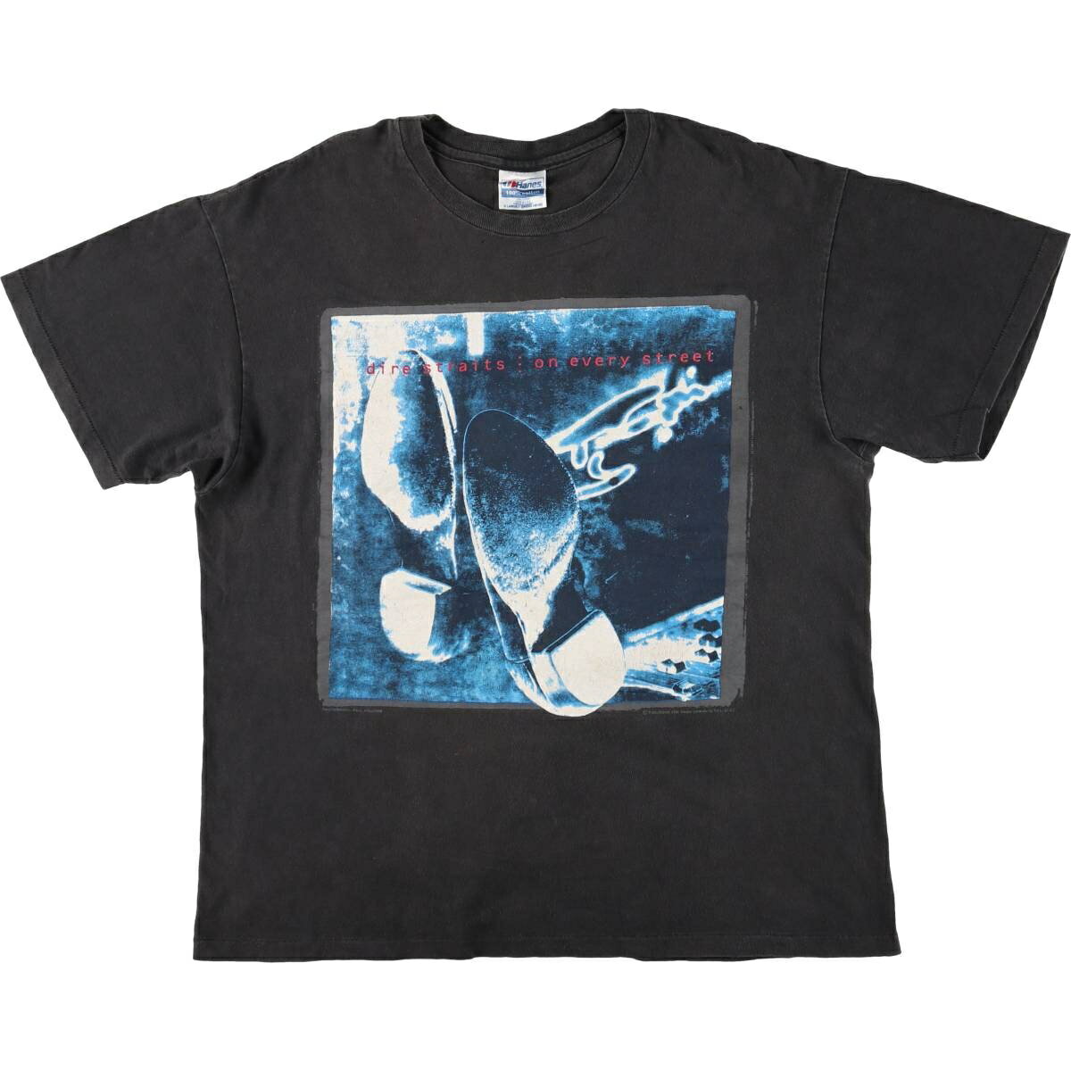 商品詳細 ブランド・Hanes・ヘインズ・ 特徴・クルーネック(丸首)・シングルステッチ・両面プリント・ヴィンテージ・100% COTTON 青タグ・ モデル/形状・Dire Straits ダイアーストレイツ・バンドTシャツ バンT・ 素...