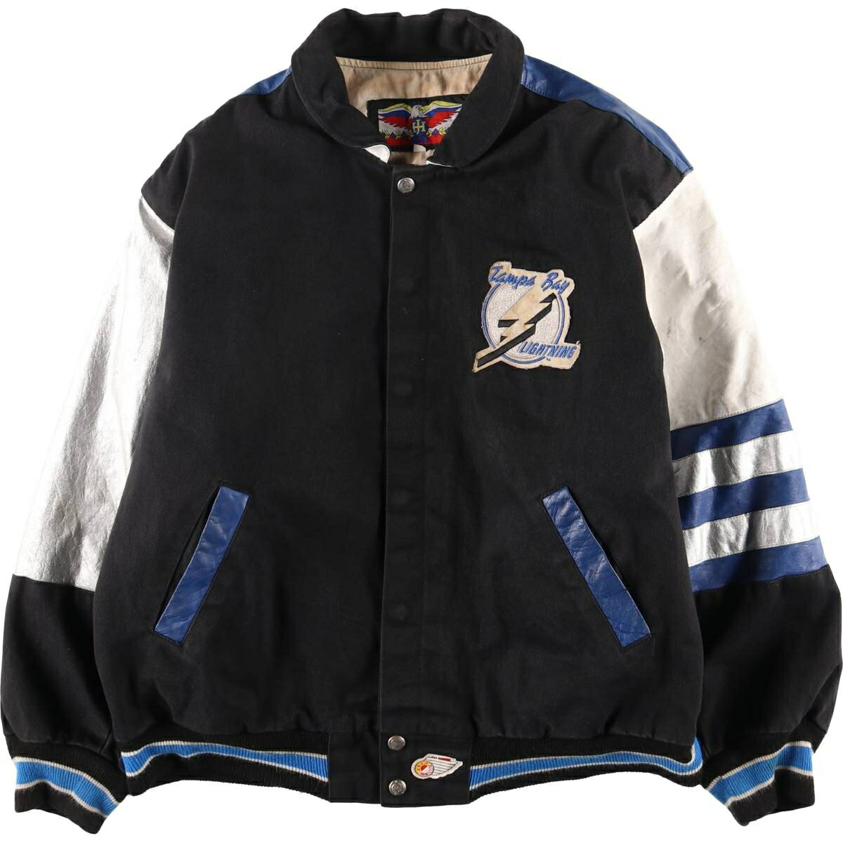 商品詳細 ブランド・JEFF HAMILTON・ 特徴・厚手・襟付き・スナップボタン・ヴィンテージ・ラインリブ・ モデル/形状・NHL TAMPA BAY LIGHTNING タンパベイライトニング・コットンボタンスタジャン バーシティジャ...