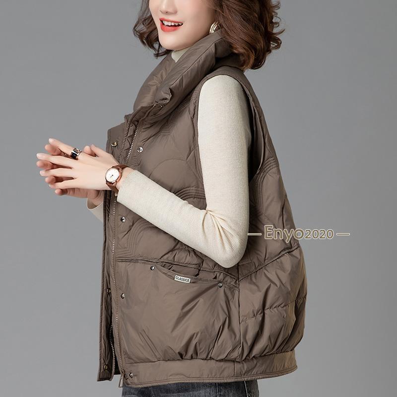 保温性抜群のボリューム満点ダウンベスト レディース ダウンコート 袖なし 軽量 無地 シンプル ハイネック 防風 防寒対策 保温 着痩せ 秋冬 カジュアルサイズ:cm S 胸囲 102 肩幅 37 袖丈 - 着丈 60M 胸囲 106 肩幅...