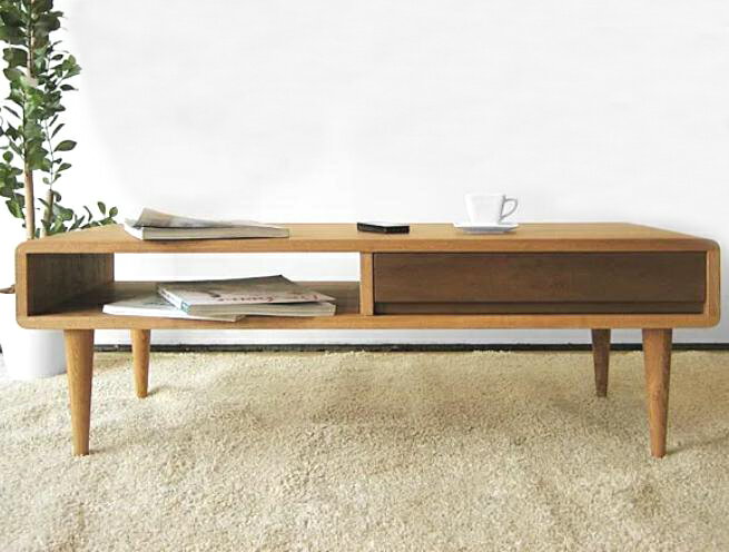 引出+収納スペース付きリビングテーブル 幅110cm ライト色 タモ材とウォールナット材を組み合わせたツートンカラーのリビングテーブル。北欧テイストの部屋作りにぴったりな、丸いフォルムがキュートなデザインのテーブルです。 脚が高いので、ボー...