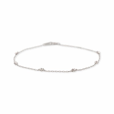 小さなホワイトトパーズを散りばめたデザイン。遊び心がある中に大人の気品を感じさせます。身に着けやすい、程よいボリューム。大切な人への一味違った贈り物としても喜ばれそうです。 WISP ウィスプ ホワイトゴールドブレスレット ホワイトトパーズ...