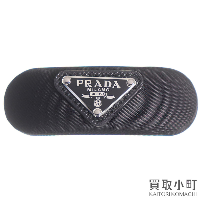 商品名Product name Re-Nylon トライアングルロゴ バレッタRe-Nylon Triangle Logo Barrette 型番Model number 1IF129 2DMI F0002 カラーColor ブラック、シル...