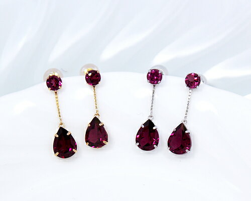 セット内容 　化粧箱・品質保証書 ピアス シリコンダブルキャッチ 地　　　金 　18金 大　き　さ 最大花：縦約20.0mm×横約6.0mm 石について ロードライトガーネット：4石/合計3.0ct 総　重　量 約1.2g 刻印 K18　1.5