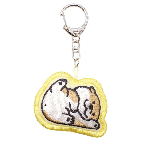 刺繍で表現された、かわいらしいむちころばんばんのキーホルダーです。本体サイズ:縦50ミリ×横60ミリ×厚さ15ミリサイズ：縦=100mm　横=75mm　厚さ=15mm商品色傾向：黄色 イラスト表紙パターン：イヌ商品番号167555商品名刺繍...