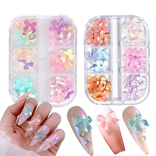 【リボンネイルパーツ】クリア感があるオーロラカラーのリボンパーツが登場!リボンネイルパーツは光の角度によって煌きが変わり、指先が綺麗に輝いています。 【サイズ&amp;素材】大きいサイズ:1cm*1.1cm。樹脂製リボンパーツは軽量で使いや...