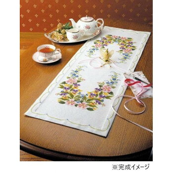 オノエ・メグミデザイン〜美しい花に囲まれて〜人が集まるテーブル上に色とりどりの花を咲かせませんか?お部屋を明るく、華やかにしてくれるテーブルセンターのクロスステッチキットです。技法は、すべてクロスステッチを使用しています。技術レベルは、中級...
