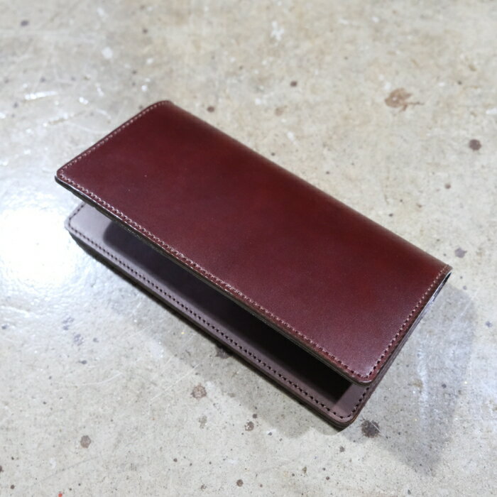■品名： WALLET Jr. ■素材： BROWN 外装：コードバン／ブラウン 内装：牛皮革／ブラウン ■仕様： カードホルダー：7／小銭入れ：1／大型ポケット（札入れ含む）：4 ■Size： 94mm×181mm×29mm ■商品： 厳...