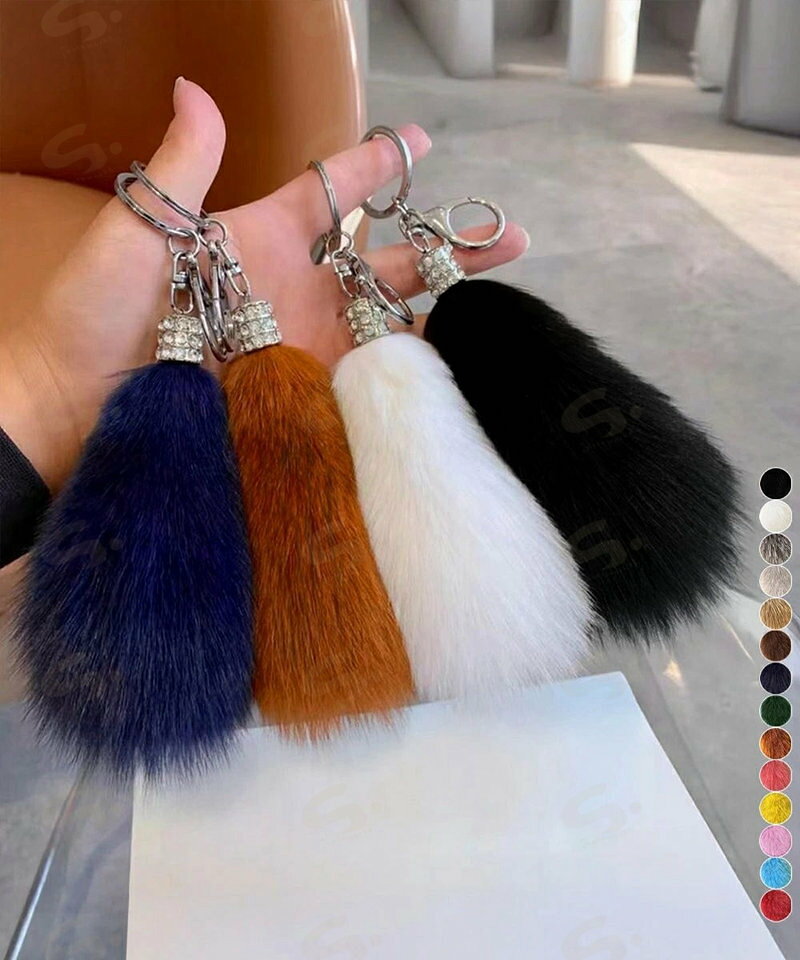 ■商品の特徴カラフル もこもこファーキーホルダー 可愛いバッグアクセサリー ボリューム 尾っぽチャーム キラキラ 鍵やバッグ飾り小物ふわふわのしっぽデザインが特徴のバッグチャームキーホルダー。 金具部分はしっかりとした作りで、鍵やポーチに簡...