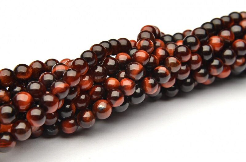 材質レッドタイガーアイ 4mmサイズ約4mm（±0.5mm）特徴・意味赤く燃える輝きが情熱と行動力を高めて、持ち主を成功や勝利へ導くと伝承される、レッドタイガーアイのブレスレットです。幸運をもたらす石として、古くから魔除けに用いられてきたレ...