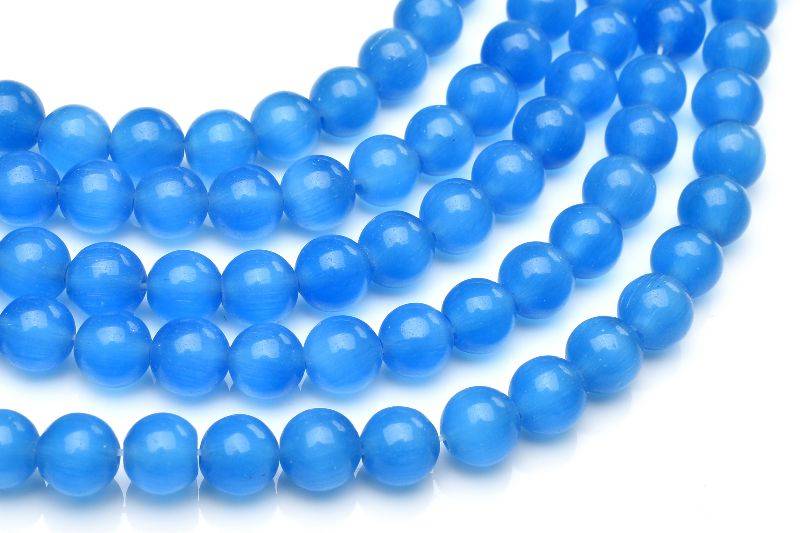 材質ブルーキャッツアイ 6mm 産地：中国サイズ約6mm(±0.5mm)重さ約20g特徴・意味カラフルなカラーと光を当てると浮かび上がるキャッツアイが美しい連材です。ハンドメイド制作にお役立てください。サイズ違いの商品でも若干色味が異なる場...