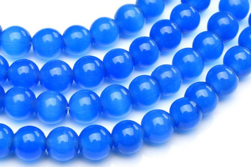 材質ブルーキャッツアイ 8mm 産地：中国サイズ約8mm(±0.5mm)重さ約32g特徴・意味カラフルなカラーと光を当てると浮かび上がるキャッツアイが美しい連材です。ハンドメイド制作にお役立てください。サイズ違いの商品でも若干色味が異なる場...