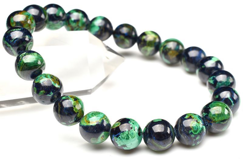 材質アズロマラカイトインクリソコラ 9.5mm 産地：ペルーサイズ約9.5mm(±0.5mm)腕周り約16.5cm(伸縮性あり)重さ約32g特徴・意味希少なアズライト・マラカイト・クリソコラが共生したブレスレットを厳選入荷しました！通常のク...