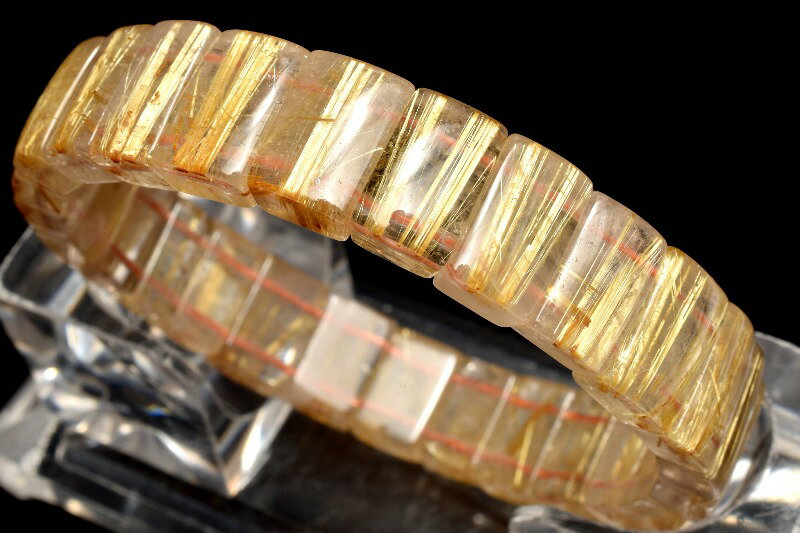 材質タイチンルチルクォーツ 6-8.5x12.5mm 産地：ブラジルサイズ約6-8.5x12.5mm腕周り約17.5cm(伸縮性あり)重さ約34g特徴・意味力強く一方向に入った針が繊細さとゴージャスさを持ち合わせており秀逸です。水晶はややミ...