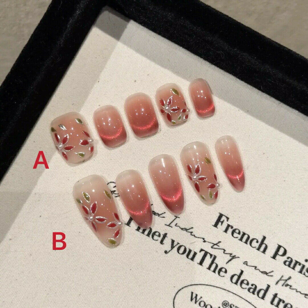 商品説明落ち着いた赤のグラデーションに、繊細な花びらホイルをあしらったナチュラル系ネイルチップ。派手すぎず上品な印象で、オフィスやお出かけなど幅広いシーンで活躍します。形状は「中楕円（Bタイプ）」と「短楕円（Aタイプ）」の2種類から選べ、お...